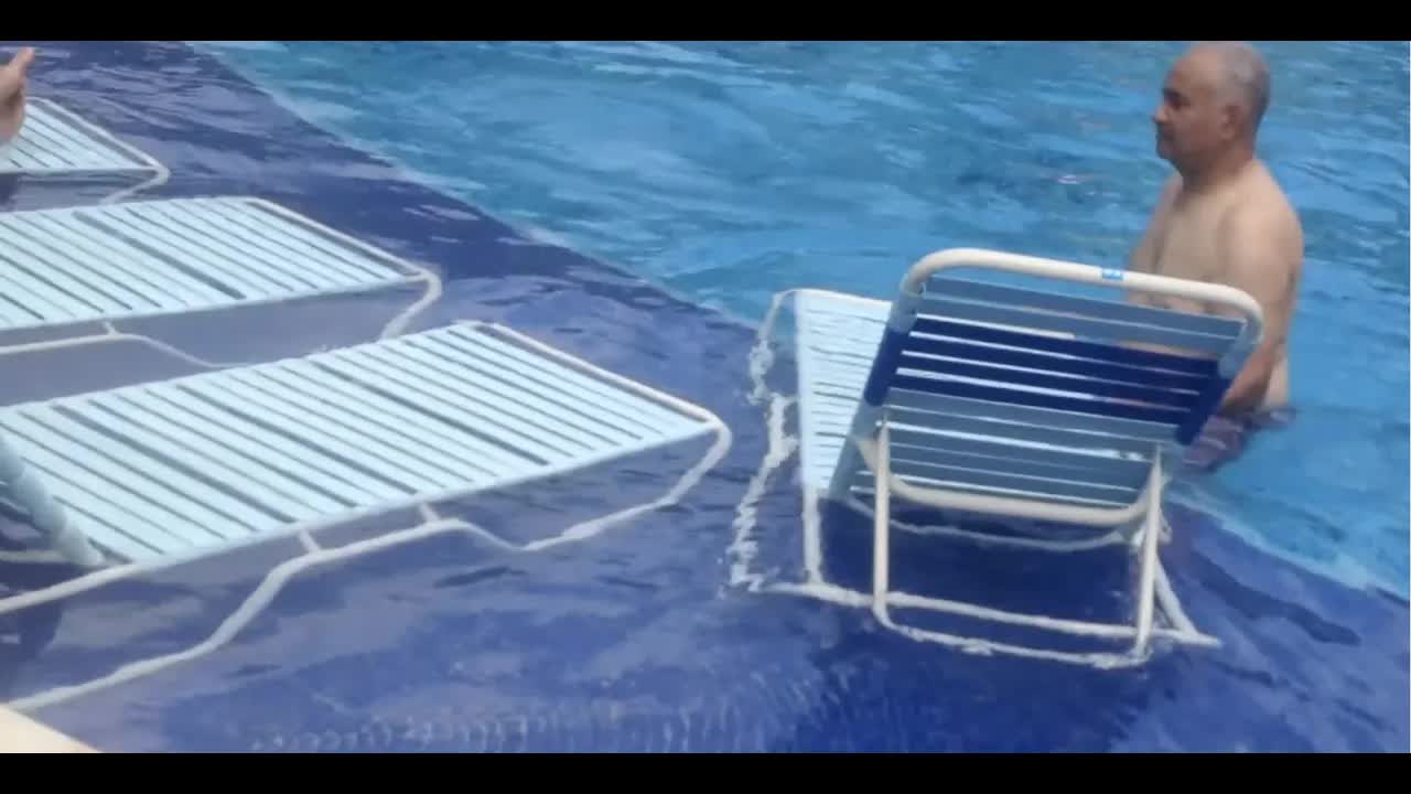 Lounge chairs in the pool