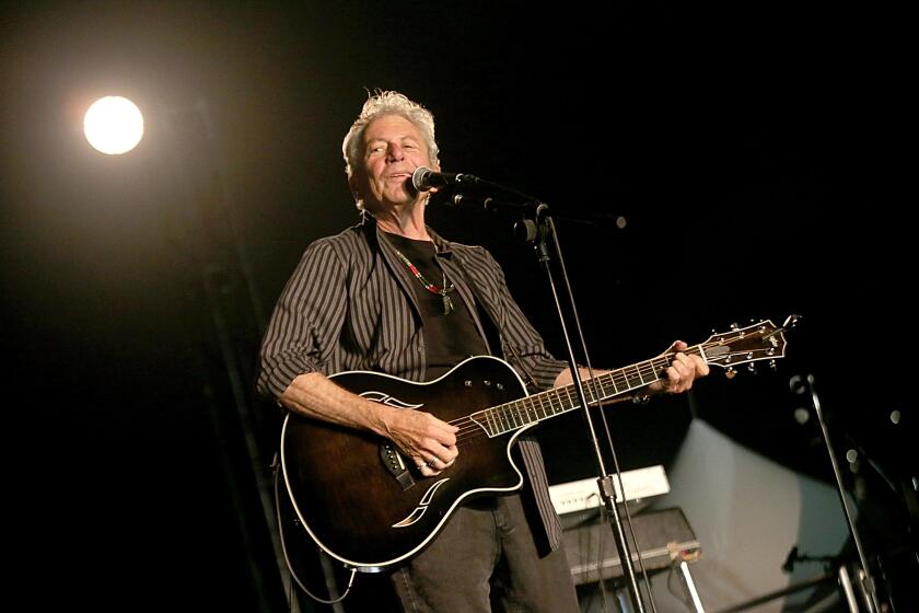 Joe Ely, Texas country-rock legend and collaborator with the Clash and ...