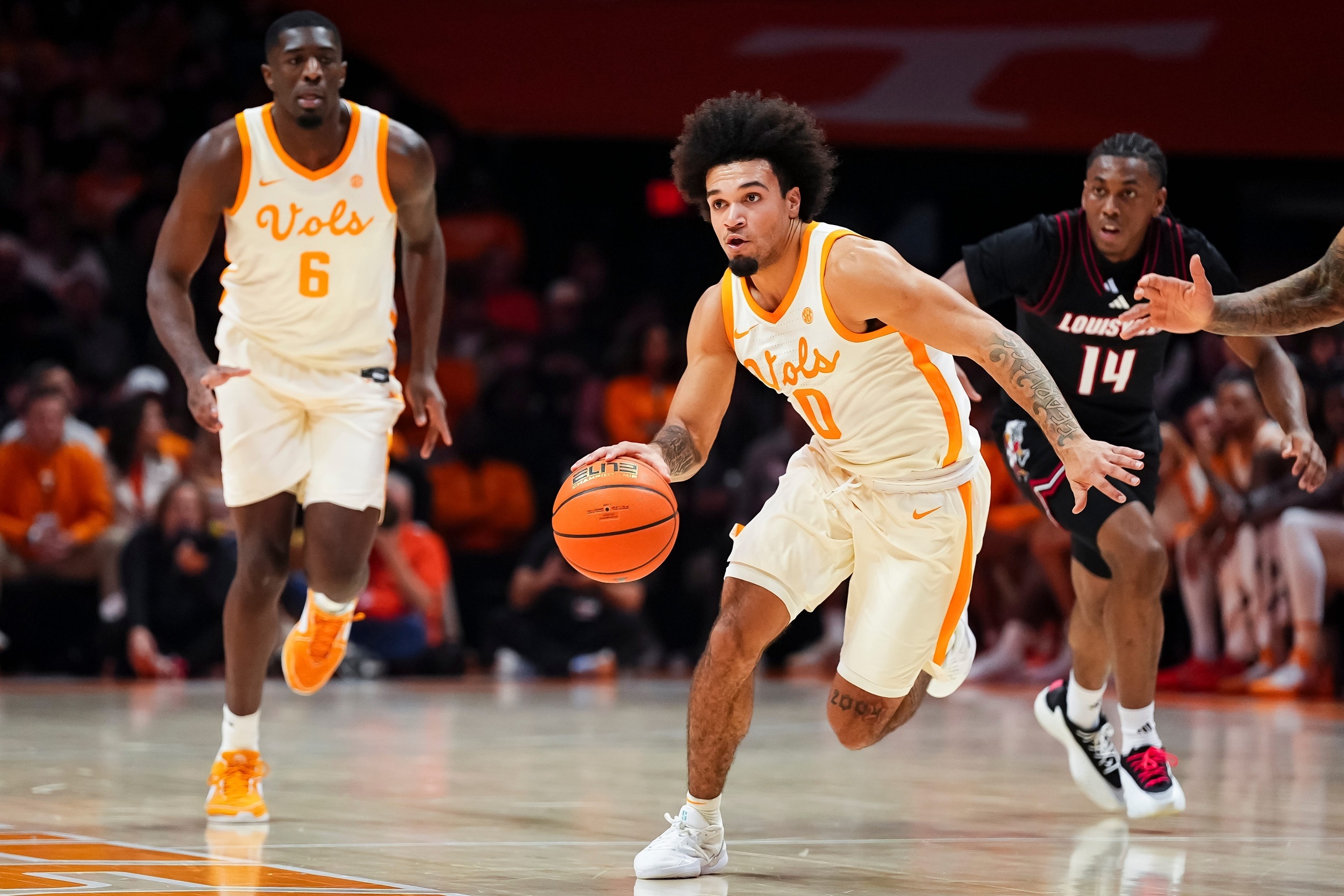 No. 20 Tennessee shuts down No. 11 Louisville to end three-game skid