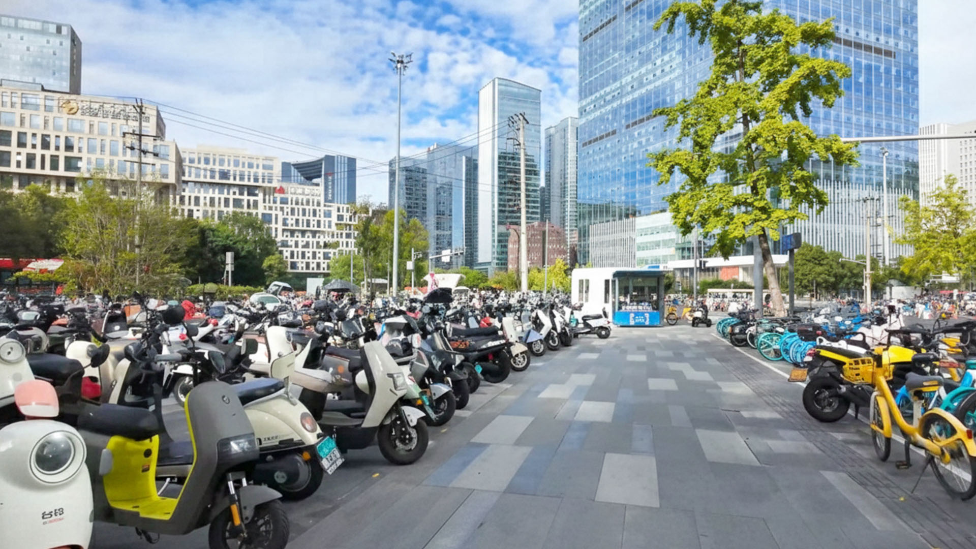Electric rides and skyscrapers define Chengdu today