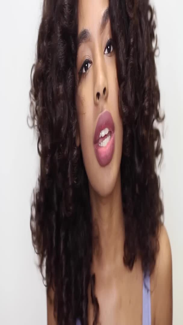 Quick festive bun updo & effortless flexi rod curls for curly hair routine