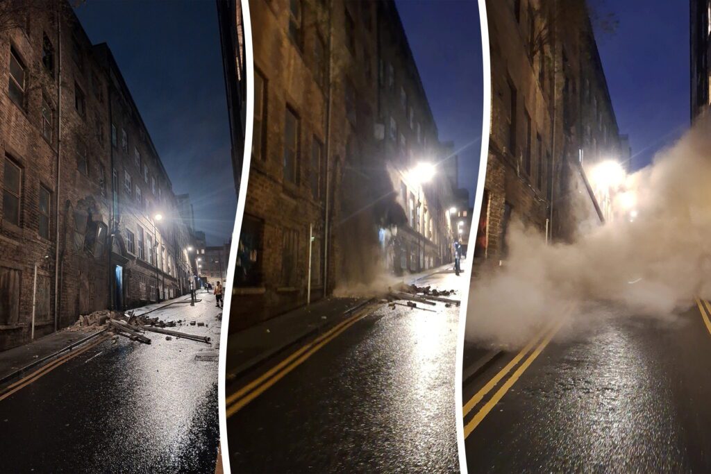 Moment abandoned building collapses – leaving piles of rubble on road