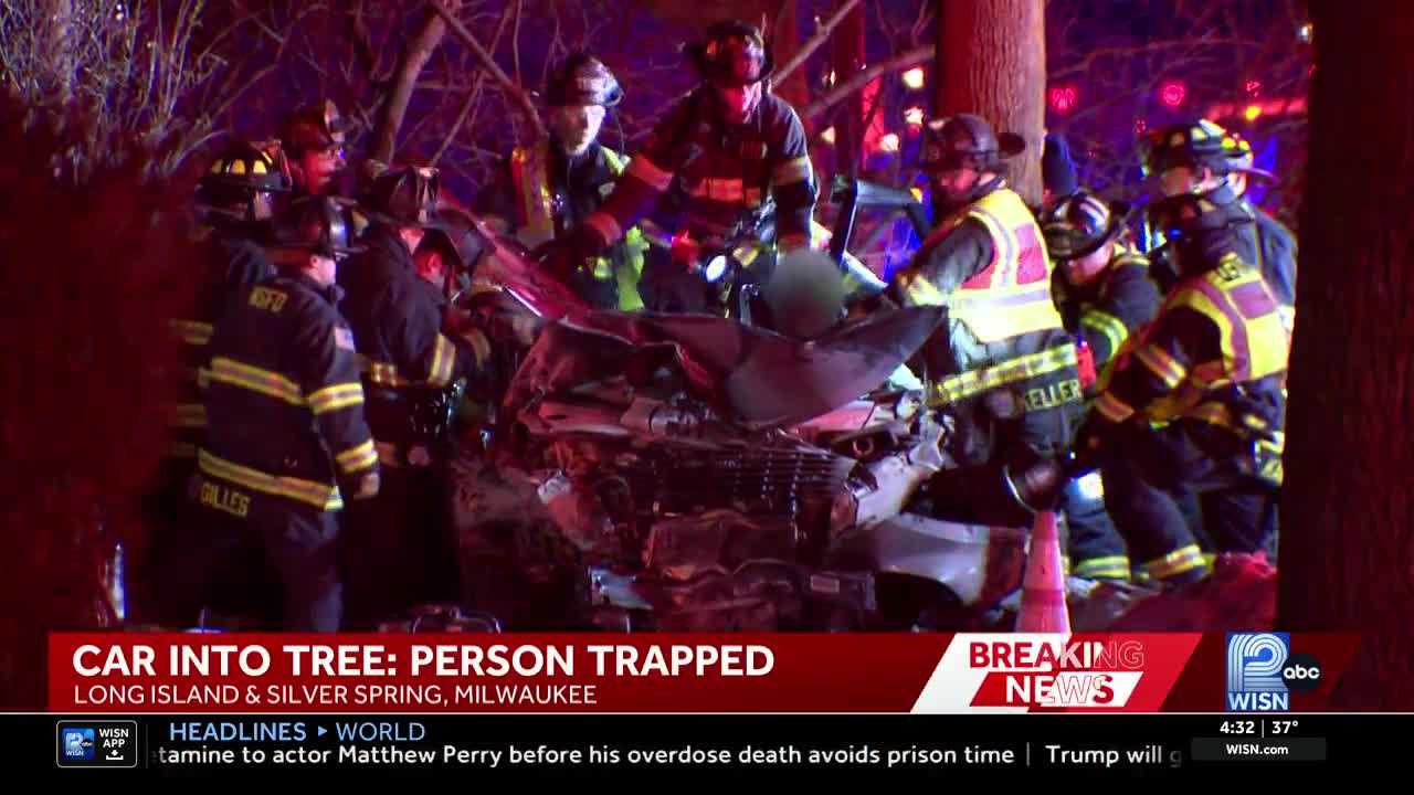 Car crashes into tree, firefighters rescue person trapped