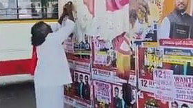 Padma Shri awardee Kinnera Mogilaiah seen scrubbing posters off pillar ...