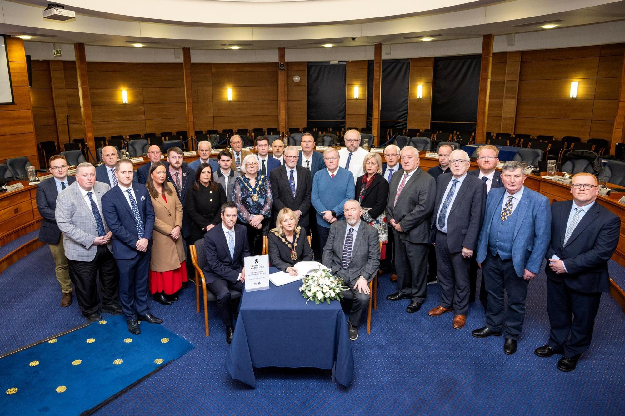 Council holds a minute's silence and opens book of condolence following ...