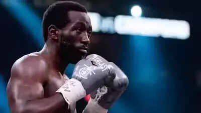 Boxing legend Crawford announces retirement after becoming three-time ...