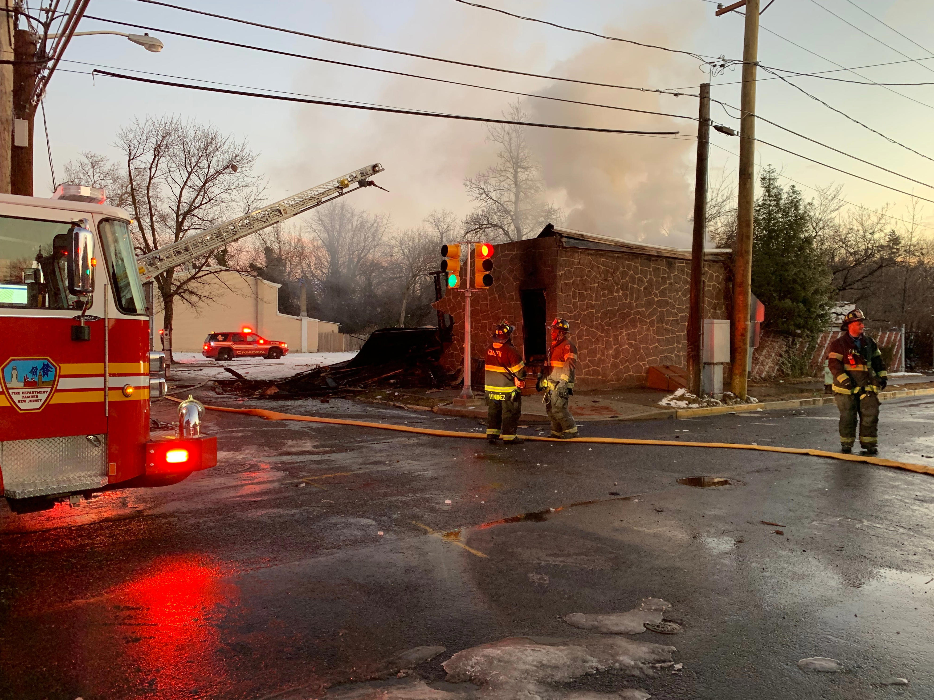 Firefighter injured while responding to Camden house fire, collapse