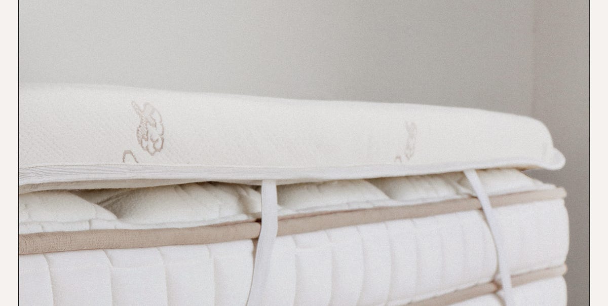I'm a hot sleeper who has tried dozens of mattress toppers—and this one ...