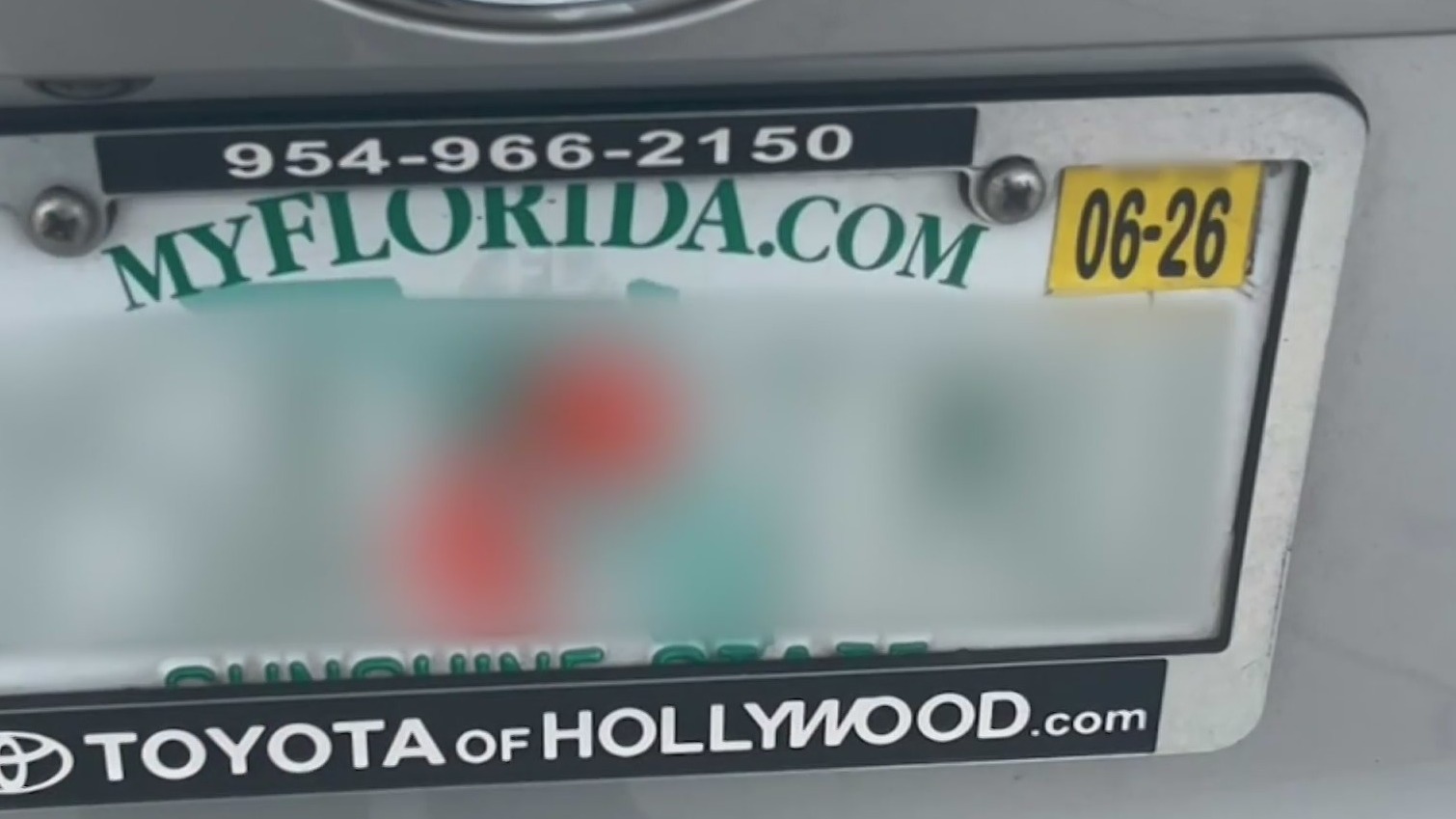 Florida clarifying state law regarding license plate frames
