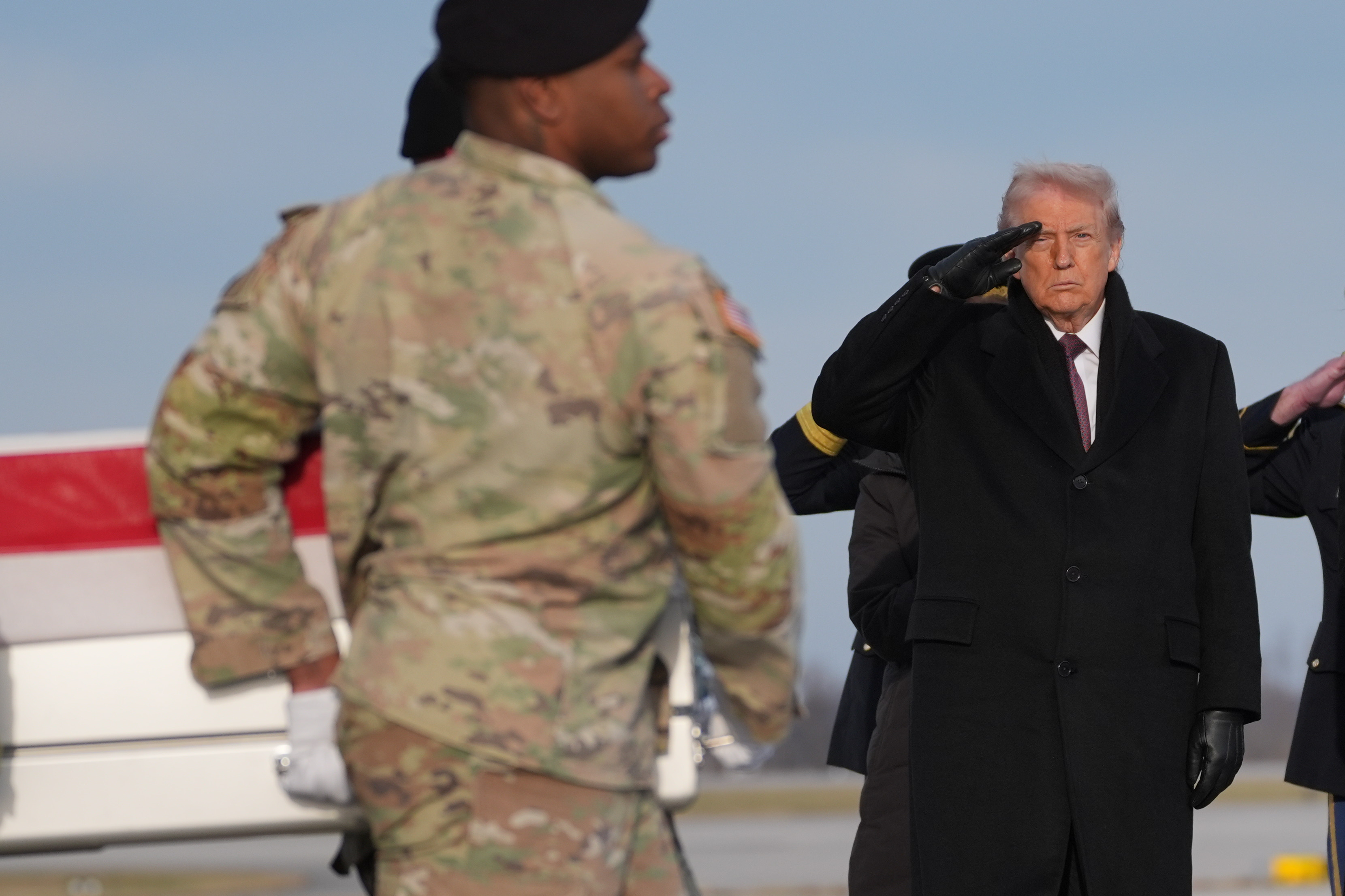 President Trump attends dignified transfer of two Iowa National Guard ...