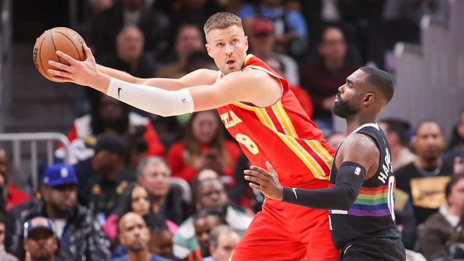 Who are some possible trade targets for the Hawks at center?