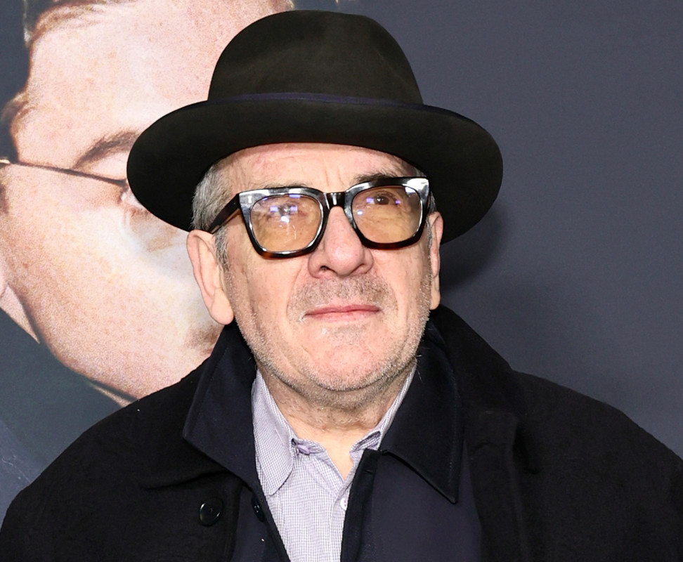 Legendary singer-songwriter Elvis Costello rocks suave look during ...