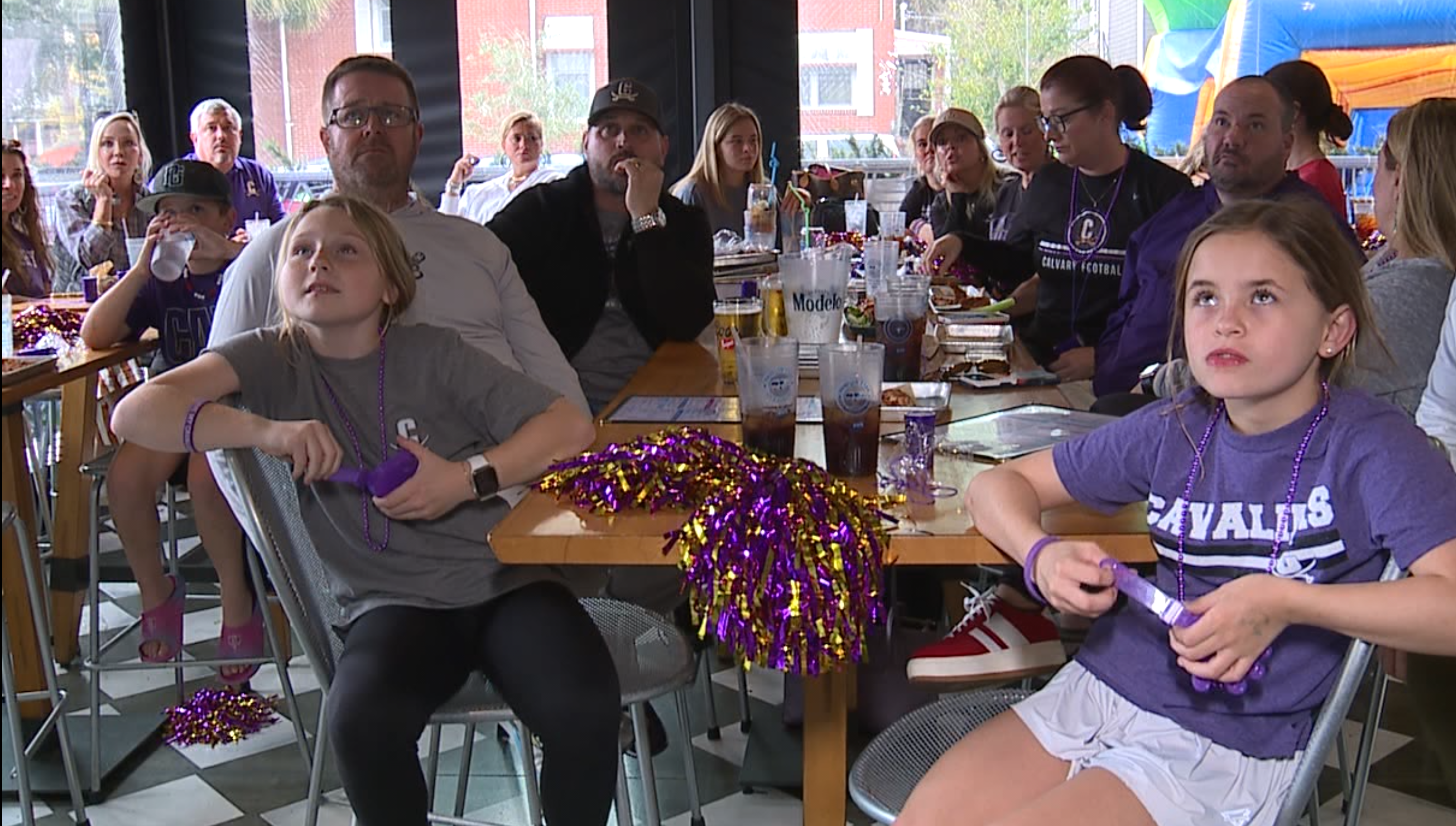 Crowd cheers on Calvary Day at state championship watch party