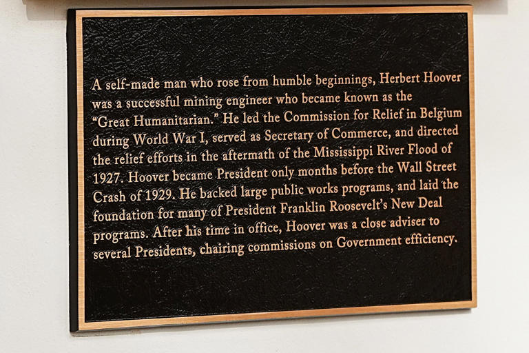 Trump unveils presidential plaques. What does Iowan Herbert Hoover's say?