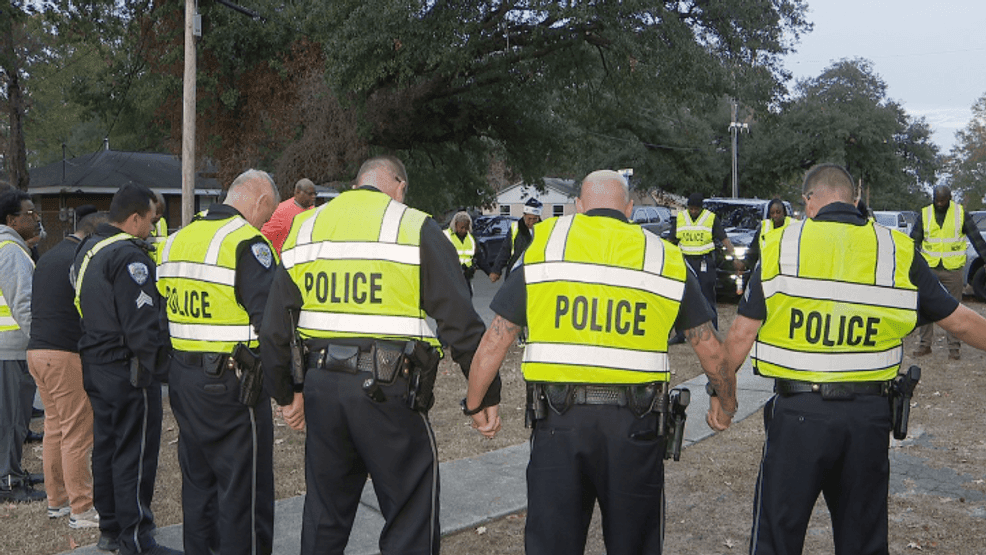 Residents and officers unite in peace walk after fatal shooting of 4 ...