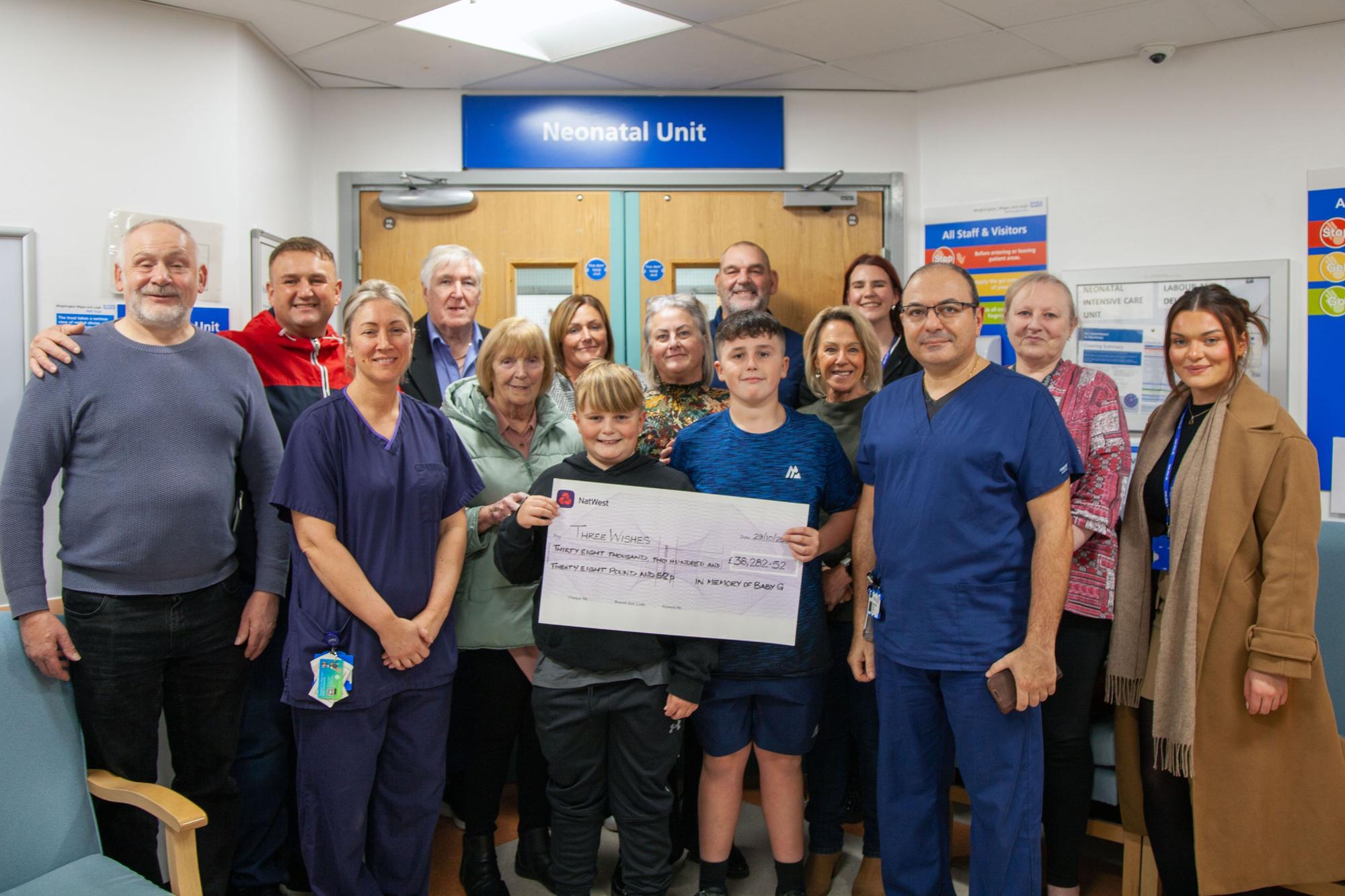Wigan hospital trust thanks a local faamily for 10 years of support