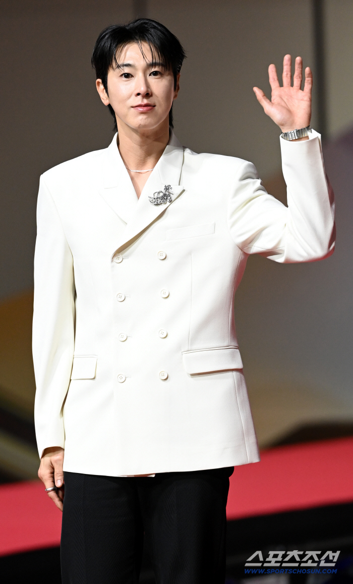 U-Know Yunho greets with a soft smile