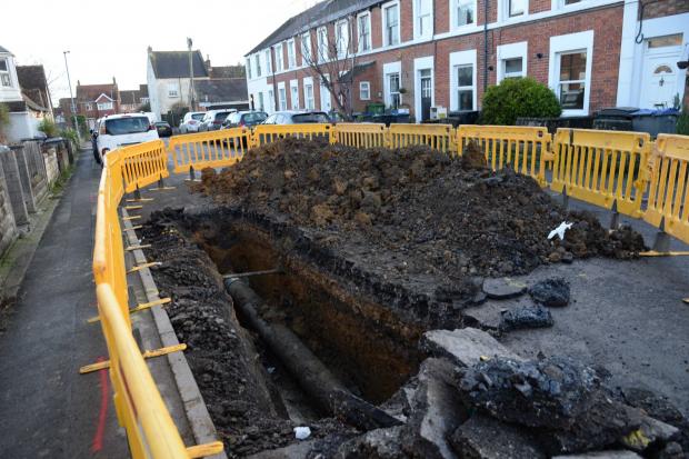 Road dug up following gas leak evacuation