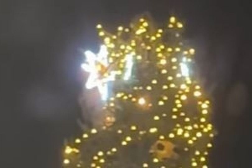 Anger as footage shows man climb town's Christmas tree to take star
