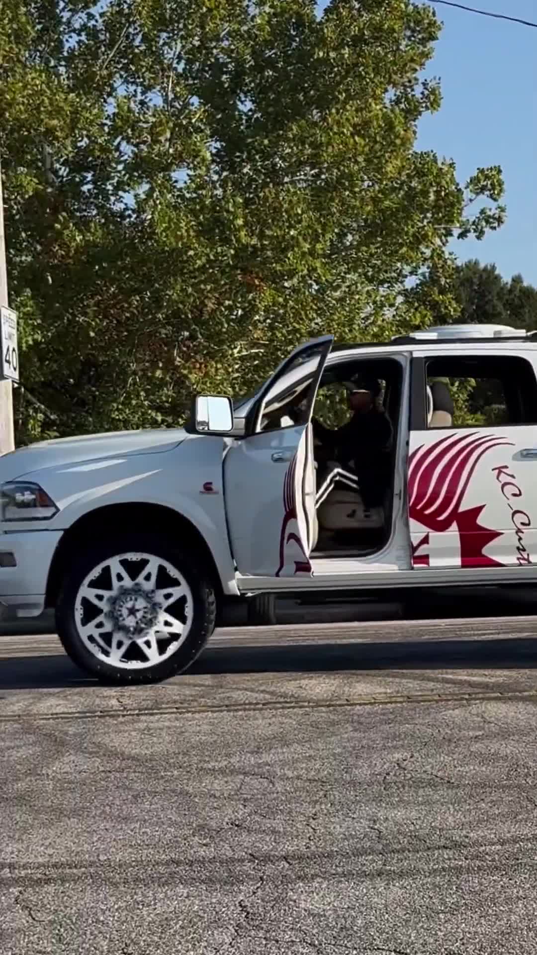 KC Customs Pullin up in his White Dodge Dually Truck on 26’s