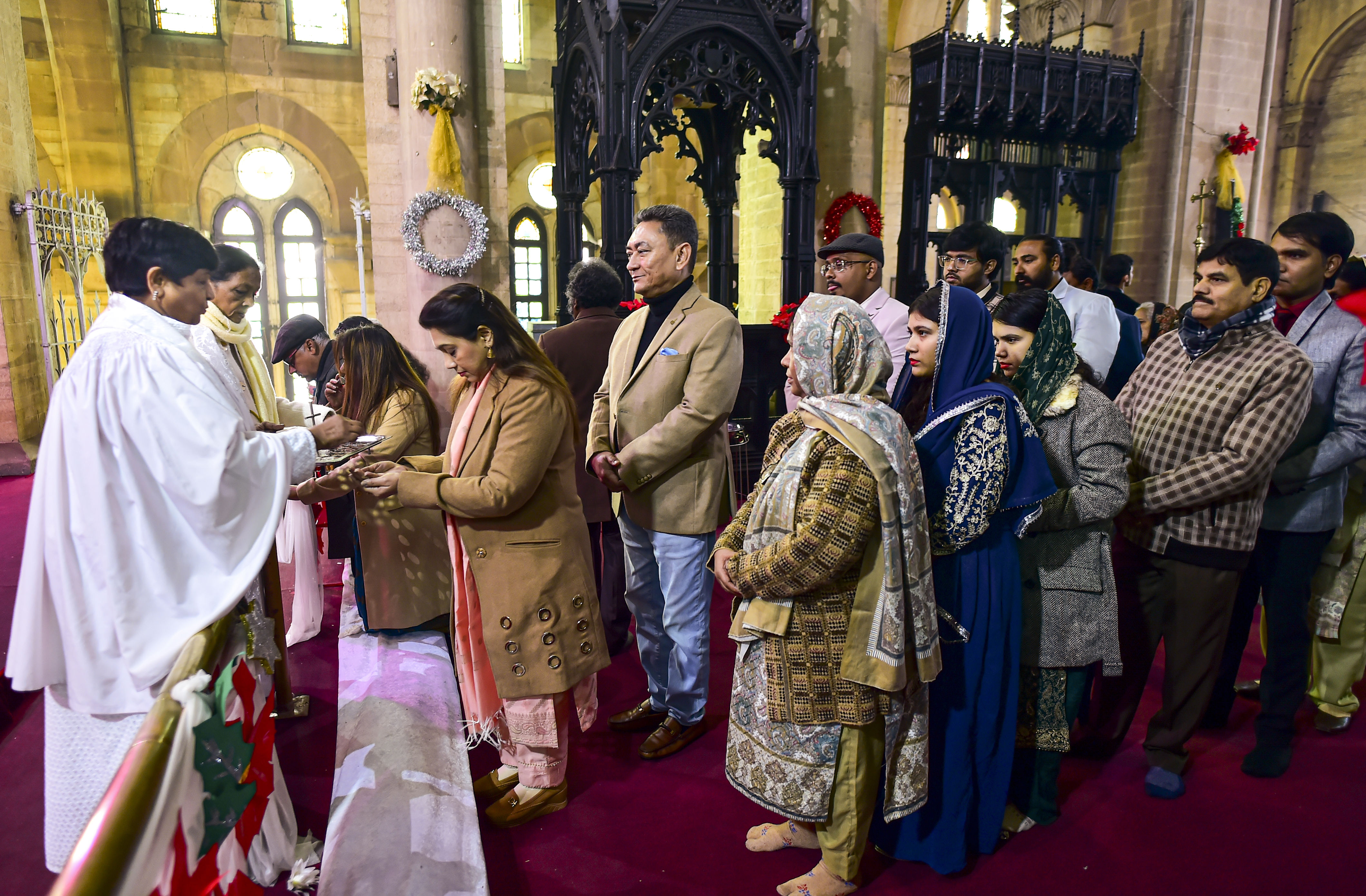 Churches decked in lights, midnight masses mark Christmas celebrations ...