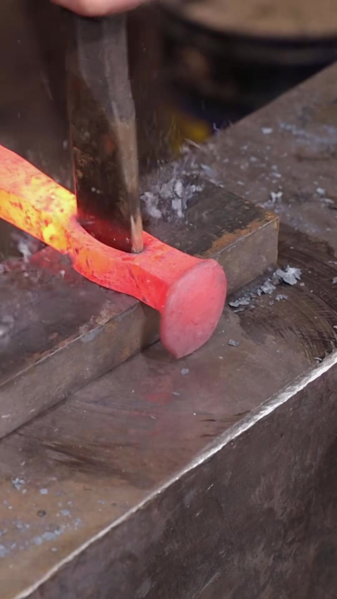Forging an axe from a railroad spike