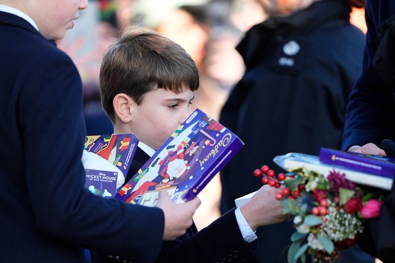 Princess Charlotte hugs fan as royals gifted presents at Sandringham
