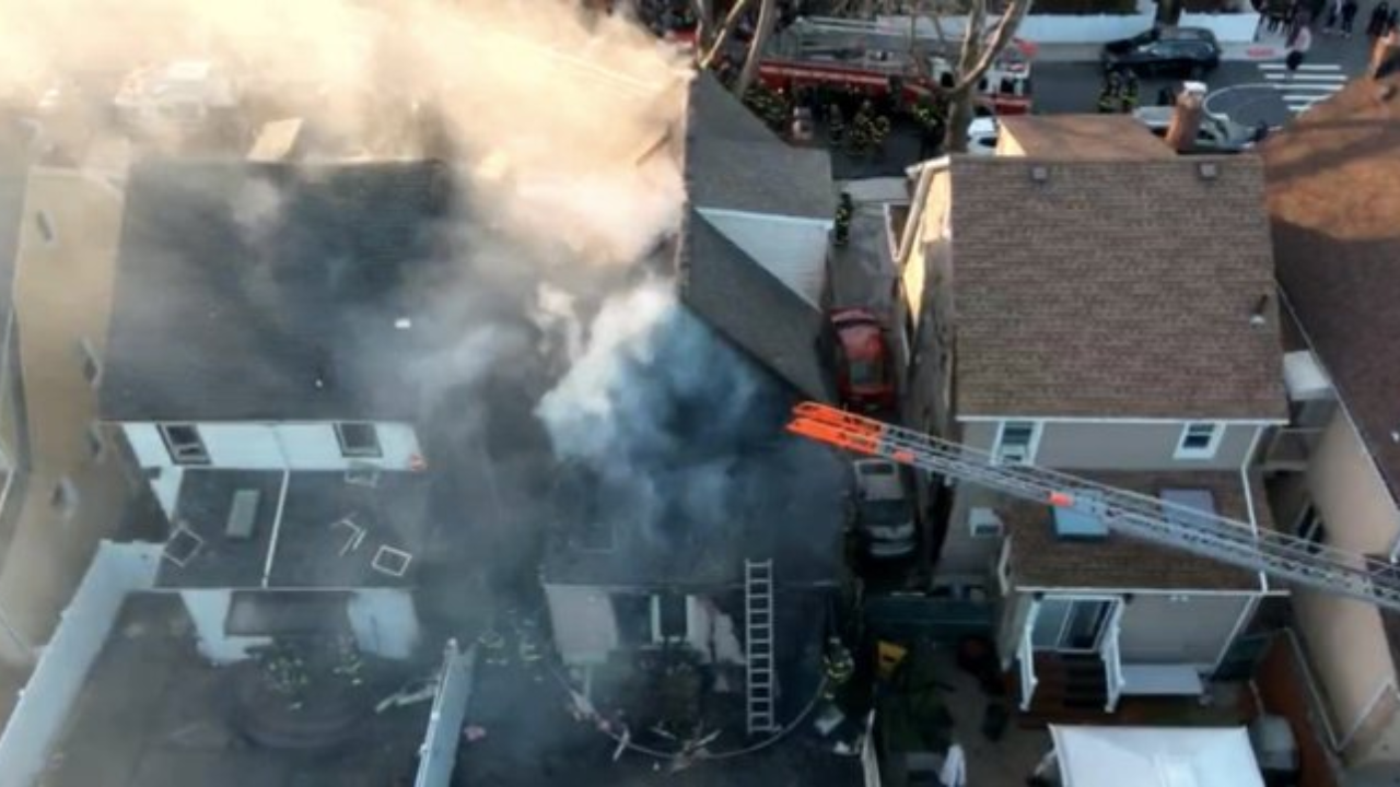 Queens fire: Multiple homes burn as massive blaze spreads on 147th ...