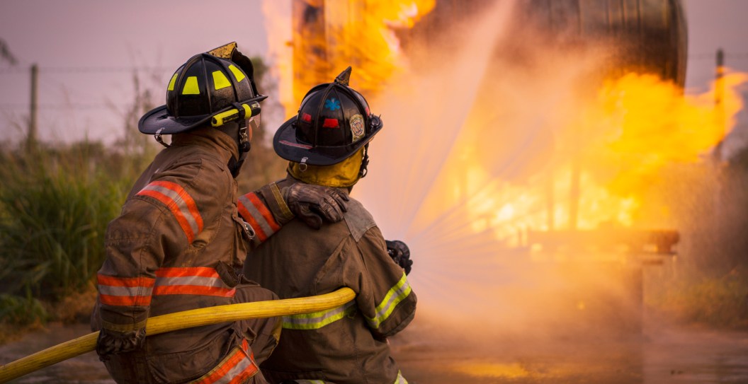 Dad burned after running back into house fire to save his young daughter