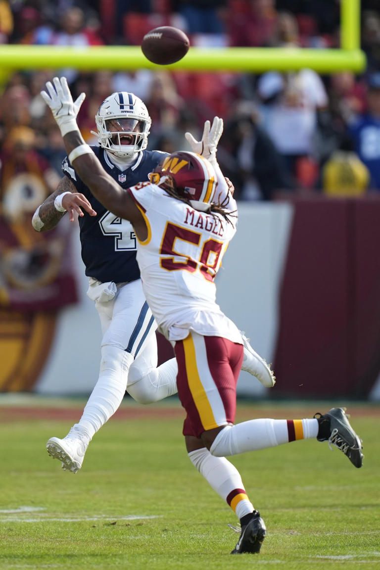 Dak Prescott throws for 307 yards and 2 TDs to lead Cowboys past skidding Commanders 30-23