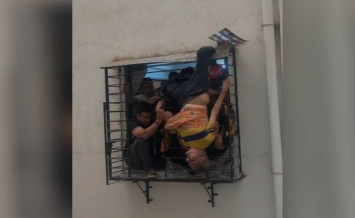 Sleeping man falls from 10th floor, avoids death as leg gets stuck in ...