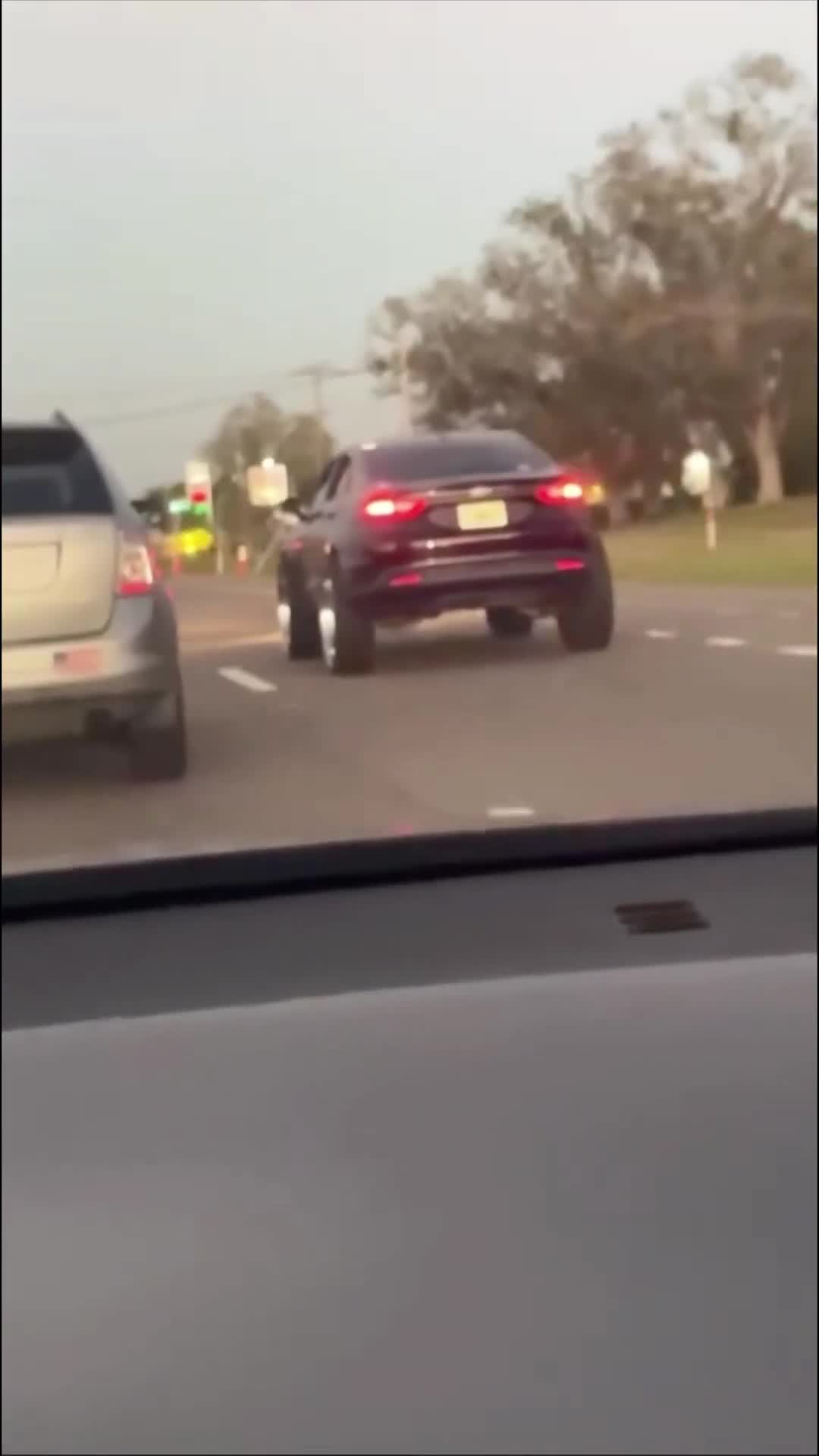 26’s Got this Car Sittin up Like a Truck