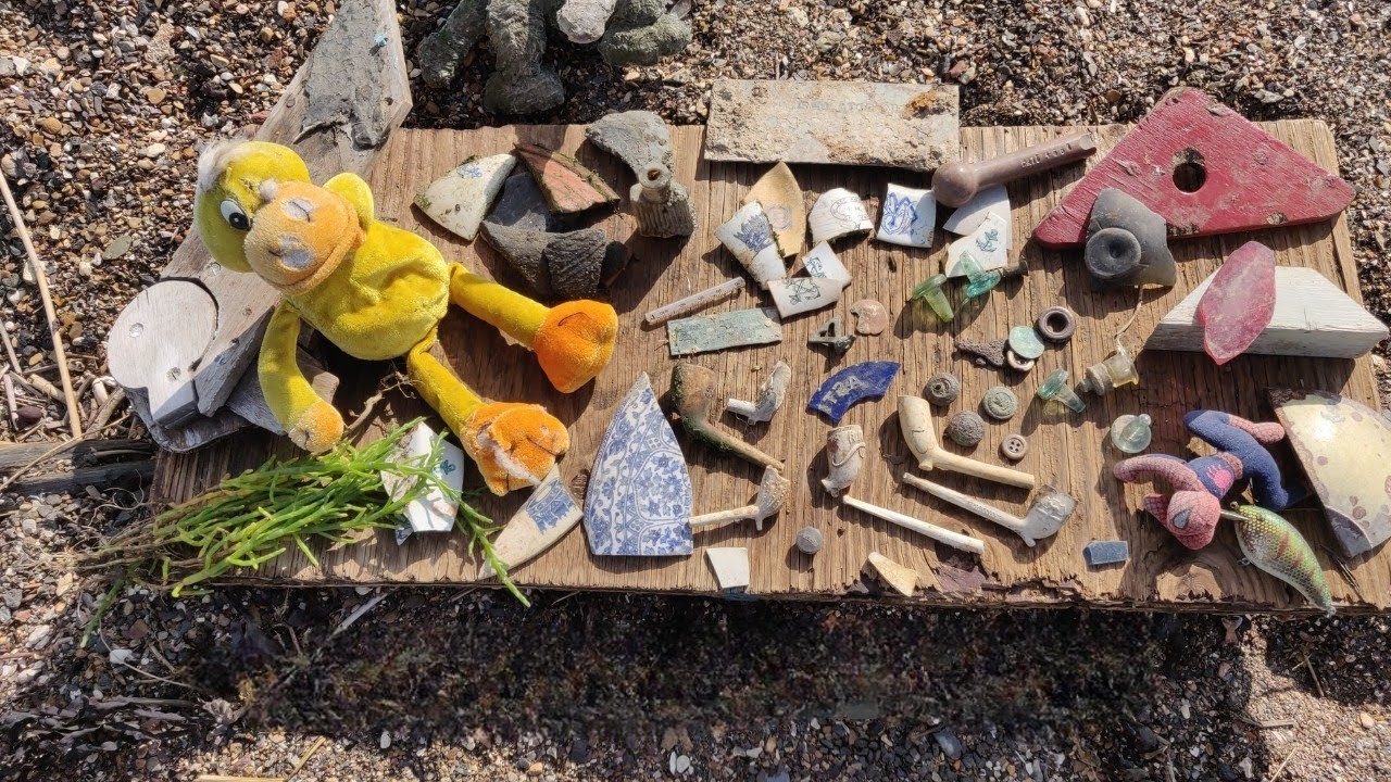 There’s a tiny man leaning on this antique pipe