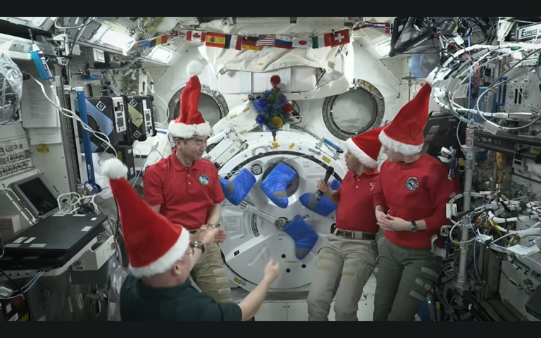 Astronauts beam home Christmas wishes from International Space Station ...
