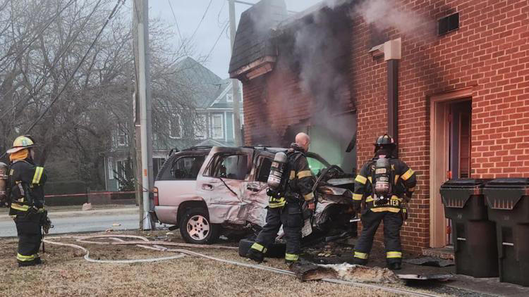 Driver seriously injured after car crashes into Suffolk building ...