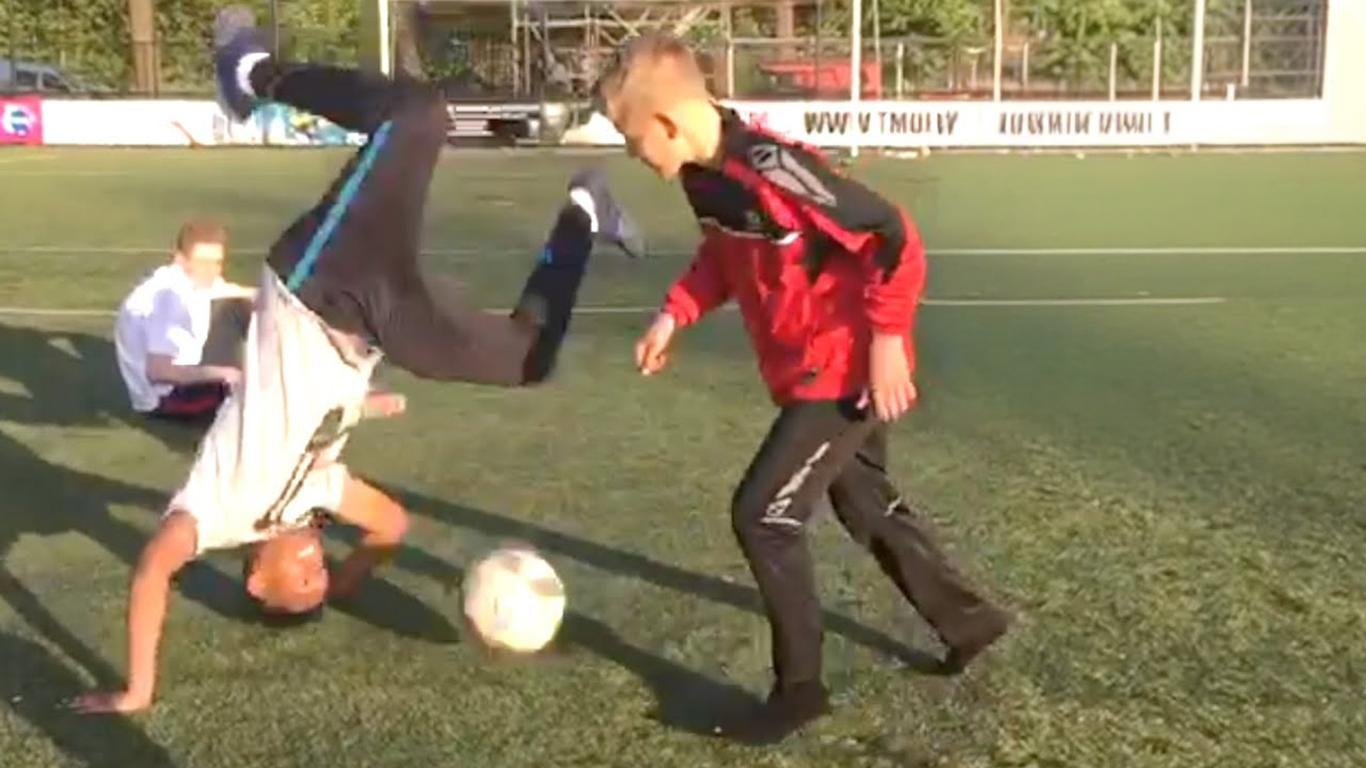 Nutmegging someone with your head