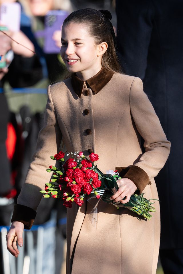 Princess Charlotte, 10, stops for a selfie during royal Christmas walk ...