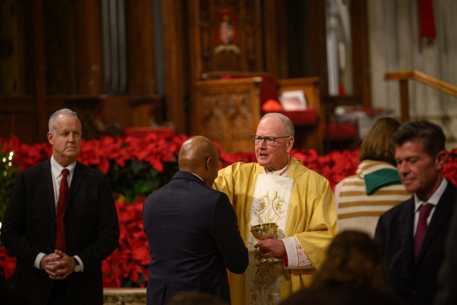 Cardinal Dolan holds his final midnight Mass on Christmas