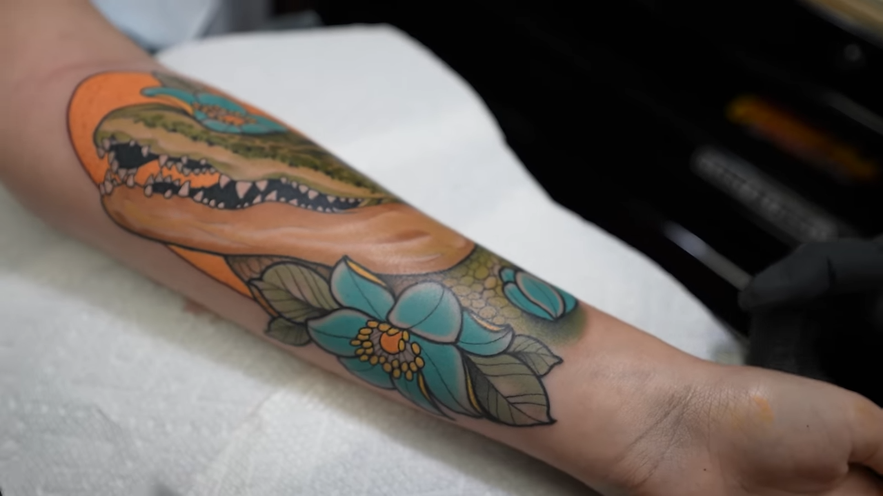 Beautiful full color alligator tattoo