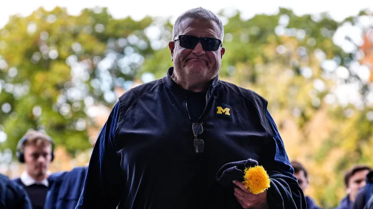 Michigan's Biff Poggi warns up to 25 players may not return after ...