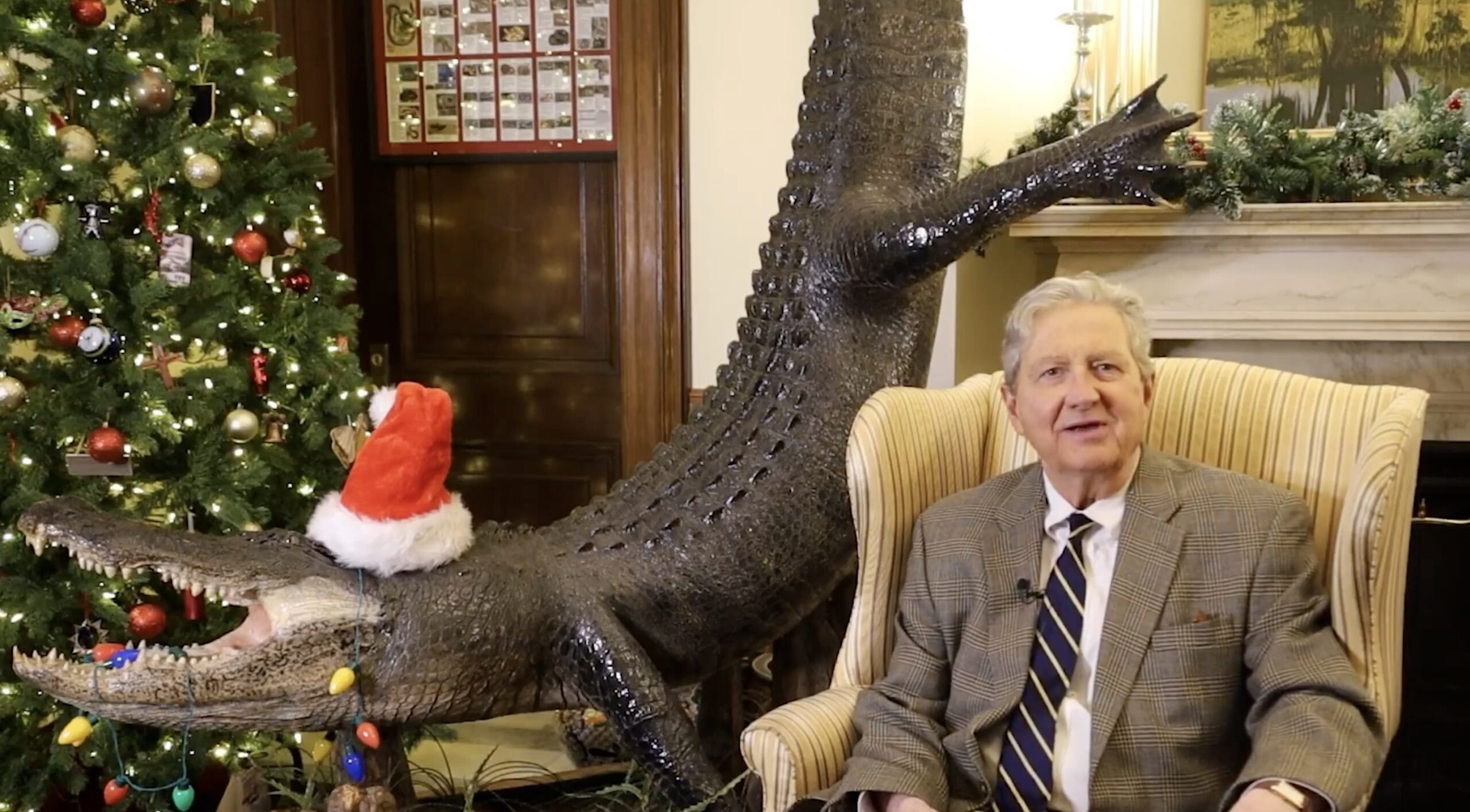Senator offers holiday wishes while sitting next to taxidermied ...