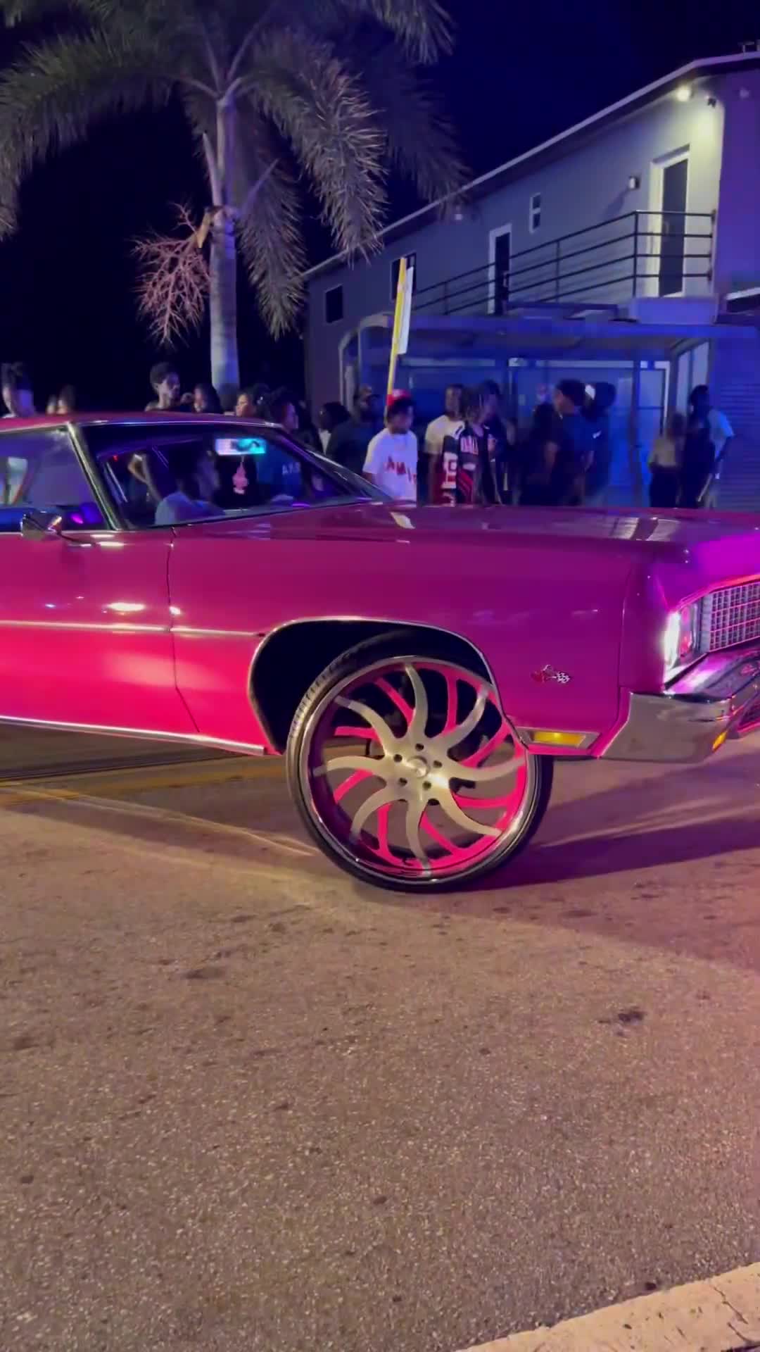 Candy pink Chevy donk on 26’s riding