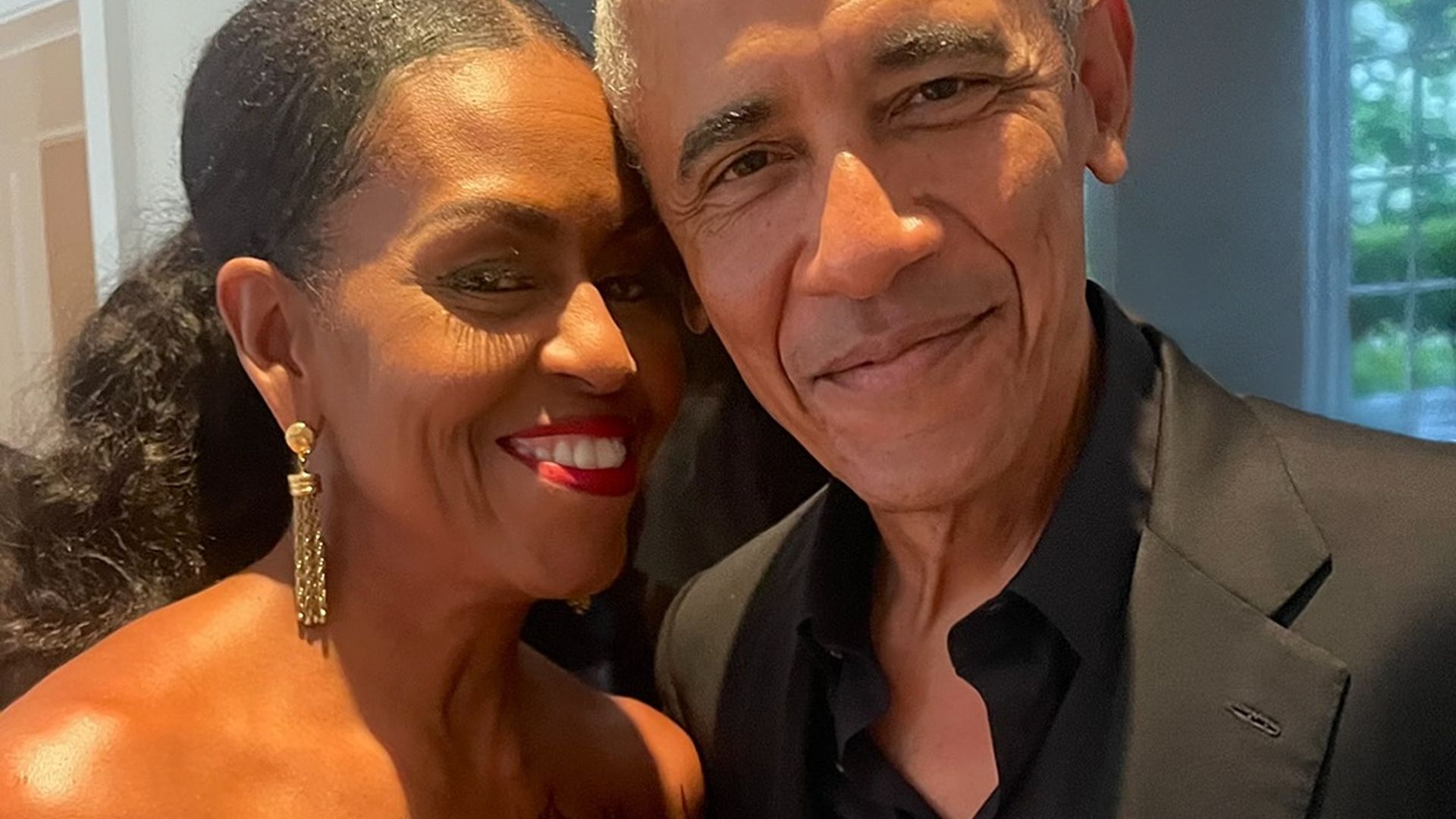 Michelle Obama shares loved-up Christmas photo with husband Barack