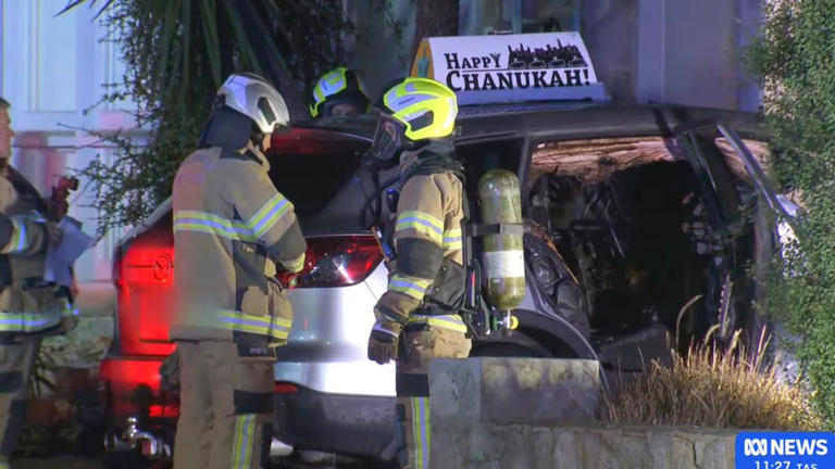 Man charged over neo-Nazi stickers and salutes