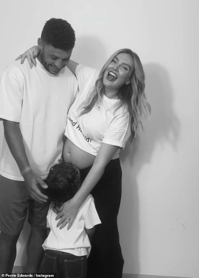 Perrie Edwards cradles her baby bump in sweet Christmas snaps as she ...