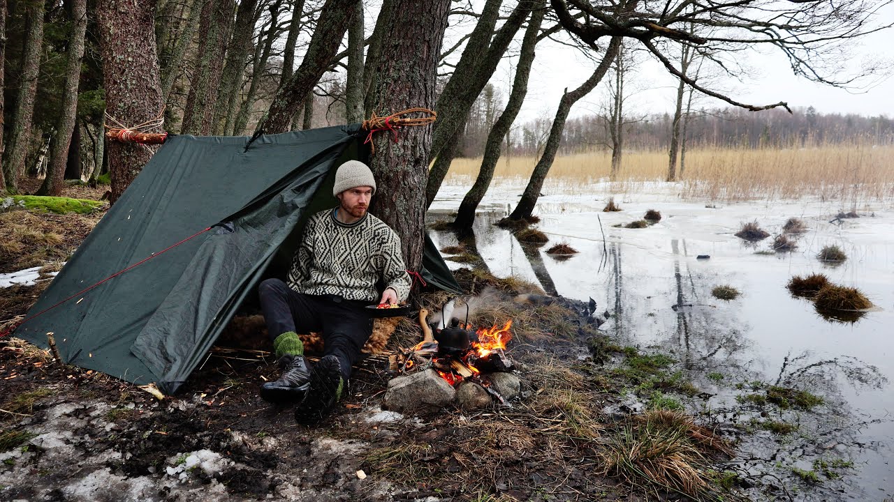 Solo adventure in frozen wetlands – winter tarp tent camping