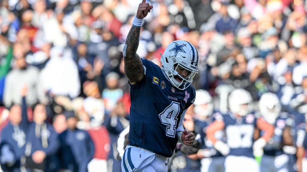Dak Prescott throws for 307 yards as Cowboys hold off Commanders 30-23