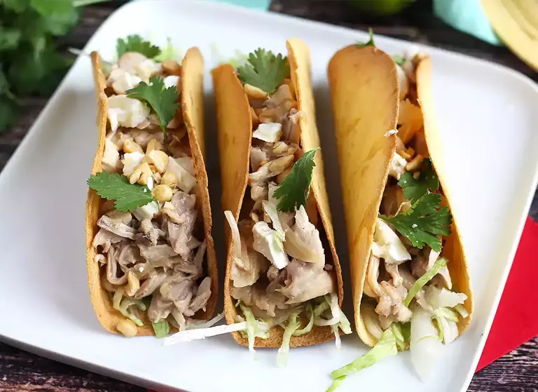 Crispy chicken tacos and satay sauce