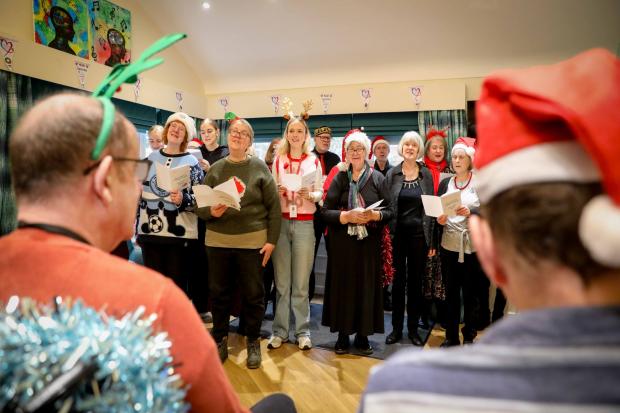 Choir's visit to Wrexham care homes 'took me right back to my schooldays'