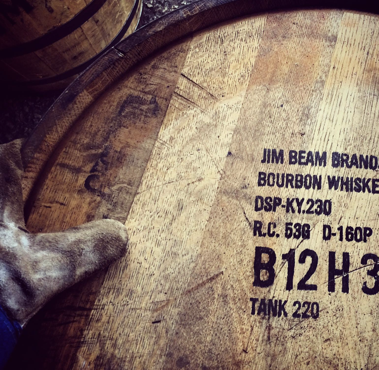 Iconic bourbon maker Jim Beam temporarily pauses production